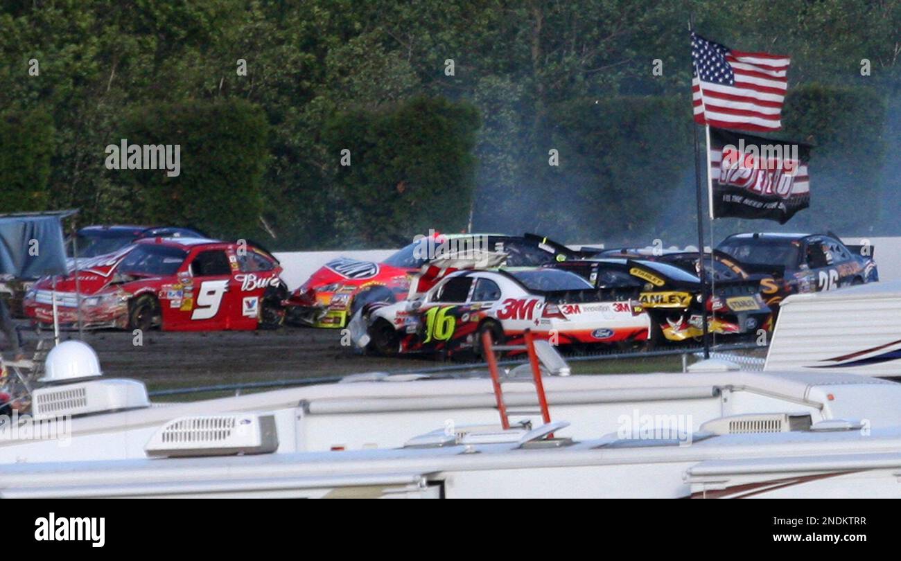 The cars of Kasey Kahne (9), Jeff Gordon, Greg Biffle (16) and others ...