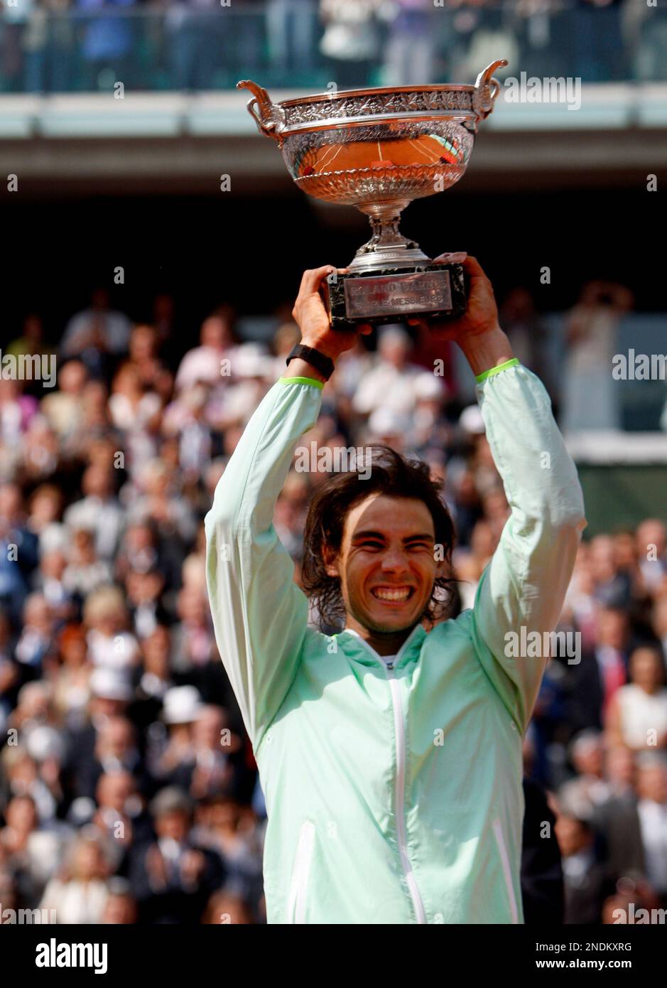 Spain's Rafael Nadal holds the cup after defeating Sweden's Robin ...