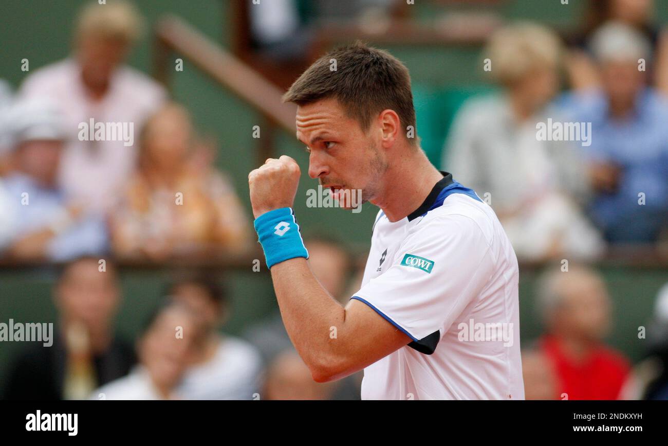 Sweden's Robin Soderling reacts after winning a point to Spain's Rafael ...