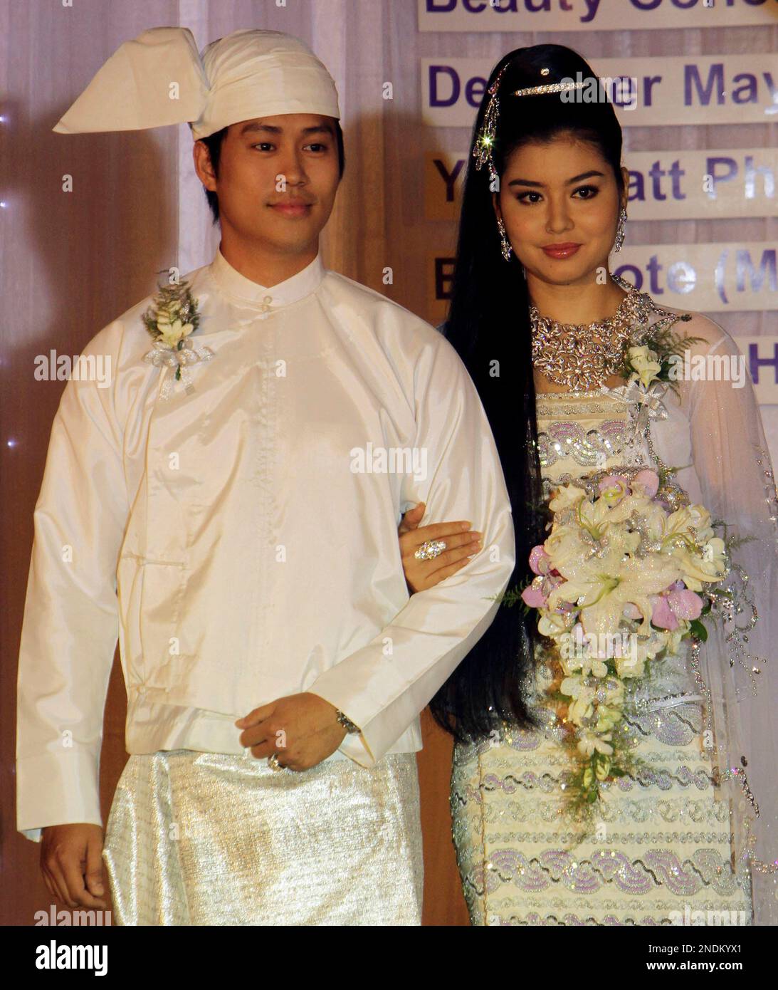 Myanmar models present wedding dress during 'Weddings of Bridal Bliss' at Traders Hotel Yangon ...
