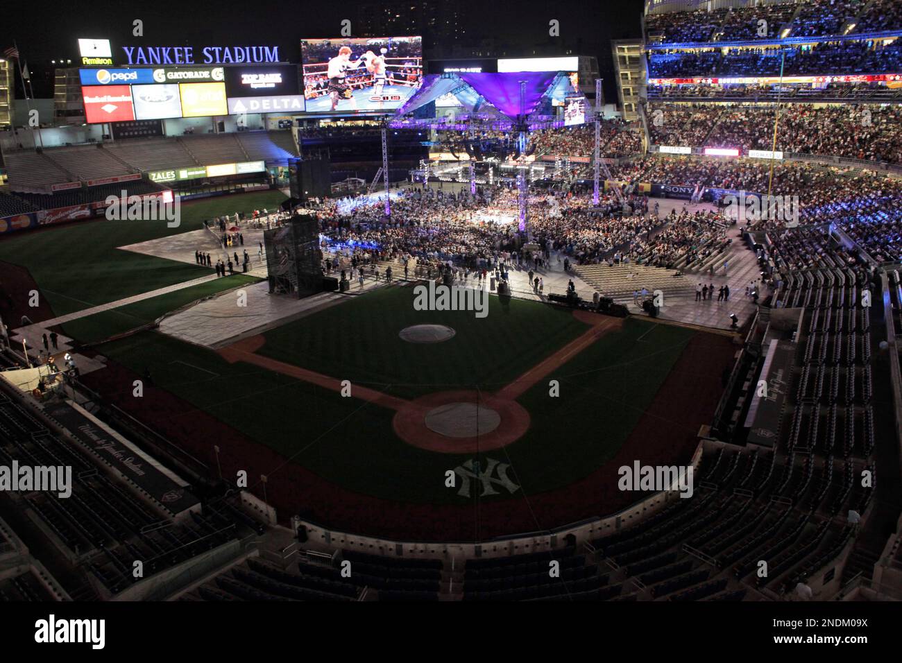 Miguel Cotto, of Puerto Rico and Yuri Foreman, of Israel, fight during ...