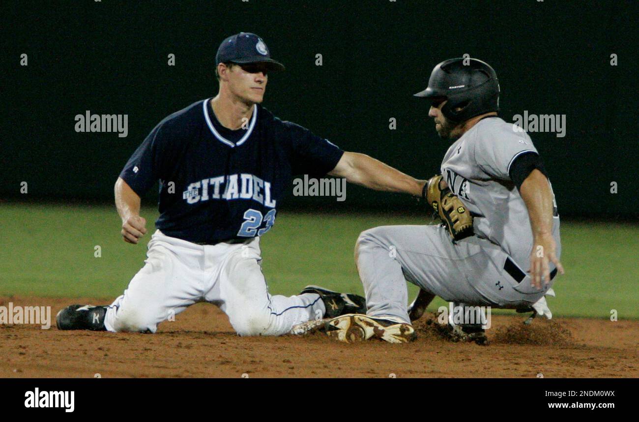 South Carolina's Adrian Morales (3) left is tagged out by Citadel's ...