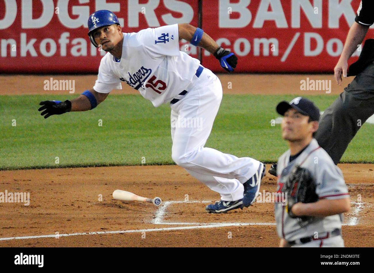 Los Angeles Dodgers' Rafael Furcal, left, watches his ball go for a ...