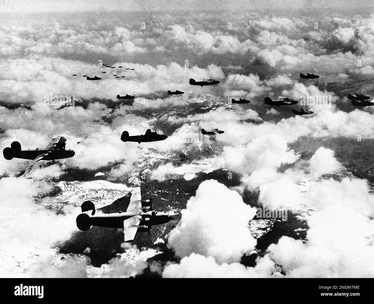 Formations of B-24 Liberator bombers of the 15th Army Air Force sweep ...