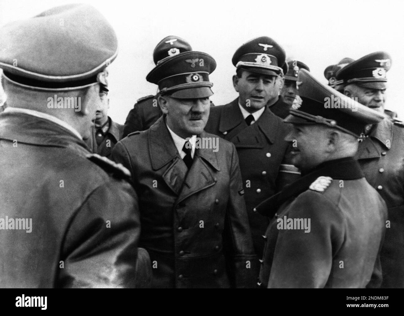 German Chancellor Adolf Hitler, centre, during a military review ...
