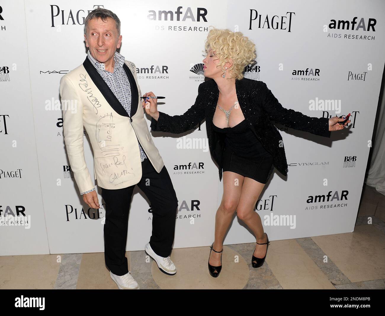 Barneys creative director Simon Doonan, left, and singer Cyndi Lauper ...