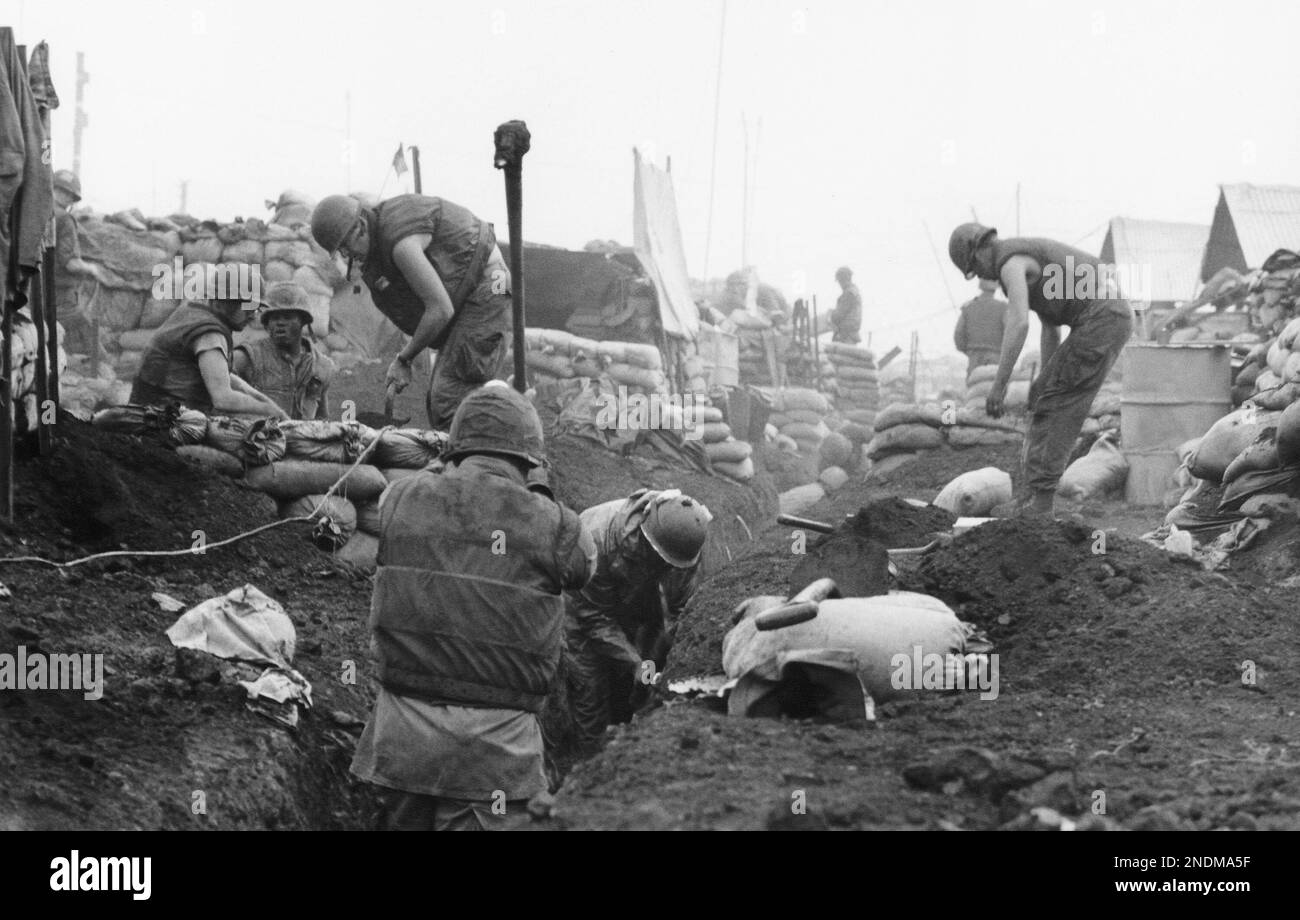 In fog and rain U.S. marines dig in deeper at Khe Sanh combat base, Feb ...