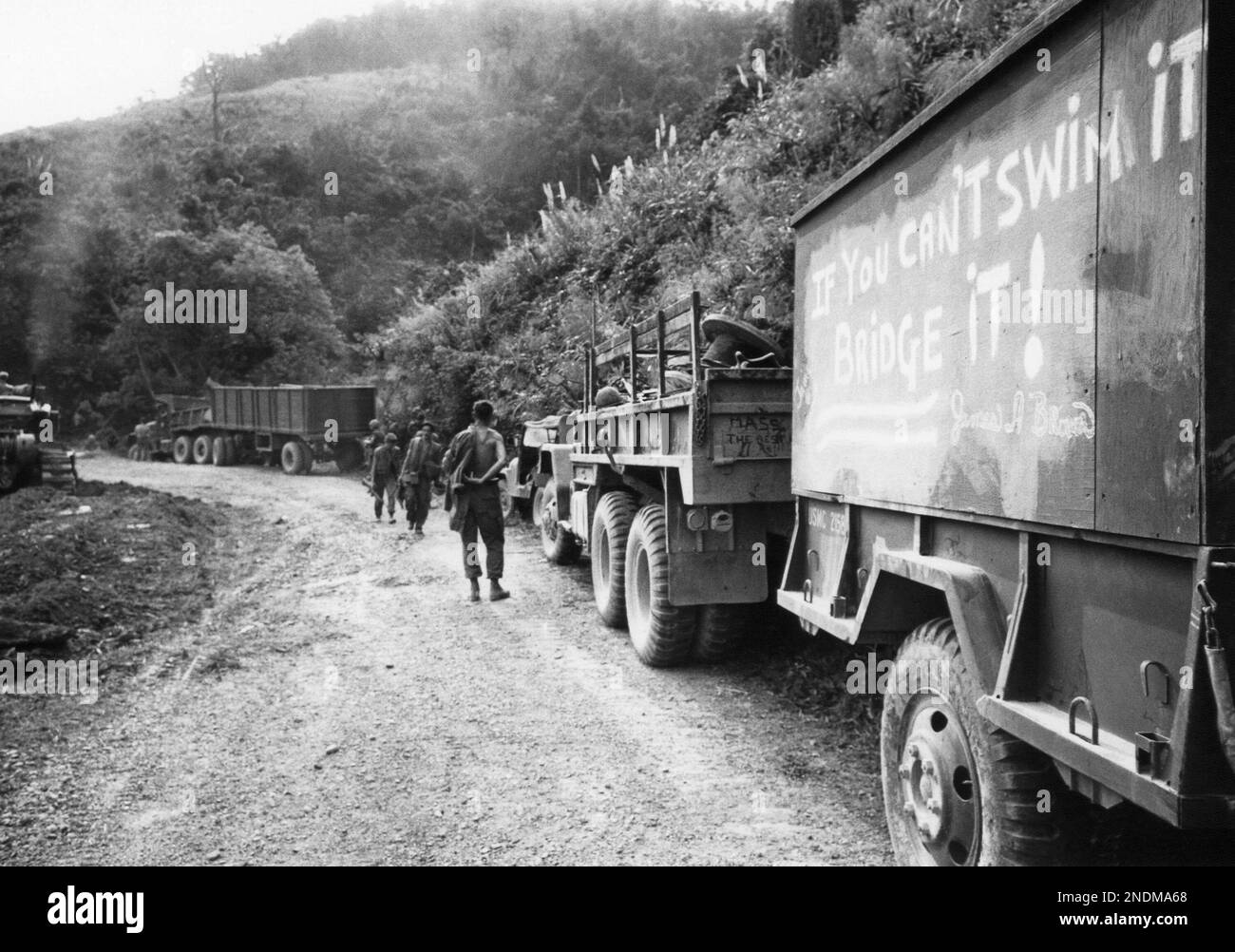 Sign on the side of a Marine Engineer trailer shows the bold ...