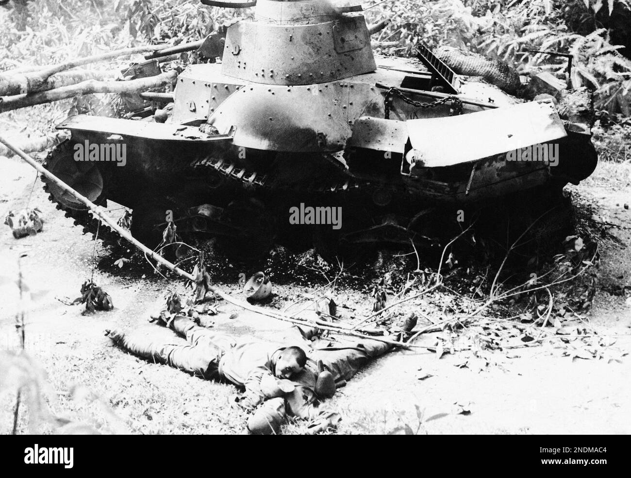 One of the Japanese tanks plated by the Australian anti-tank fire in ...