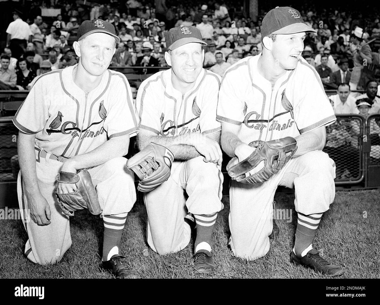 Three St. Louis cards before game on August 23, 1949 from left to right ...