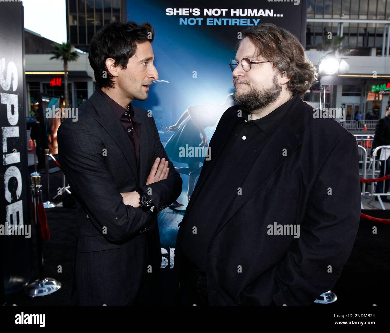 Producer Guillermo Del Toro, right, and cast member Adrien Brody talk ...