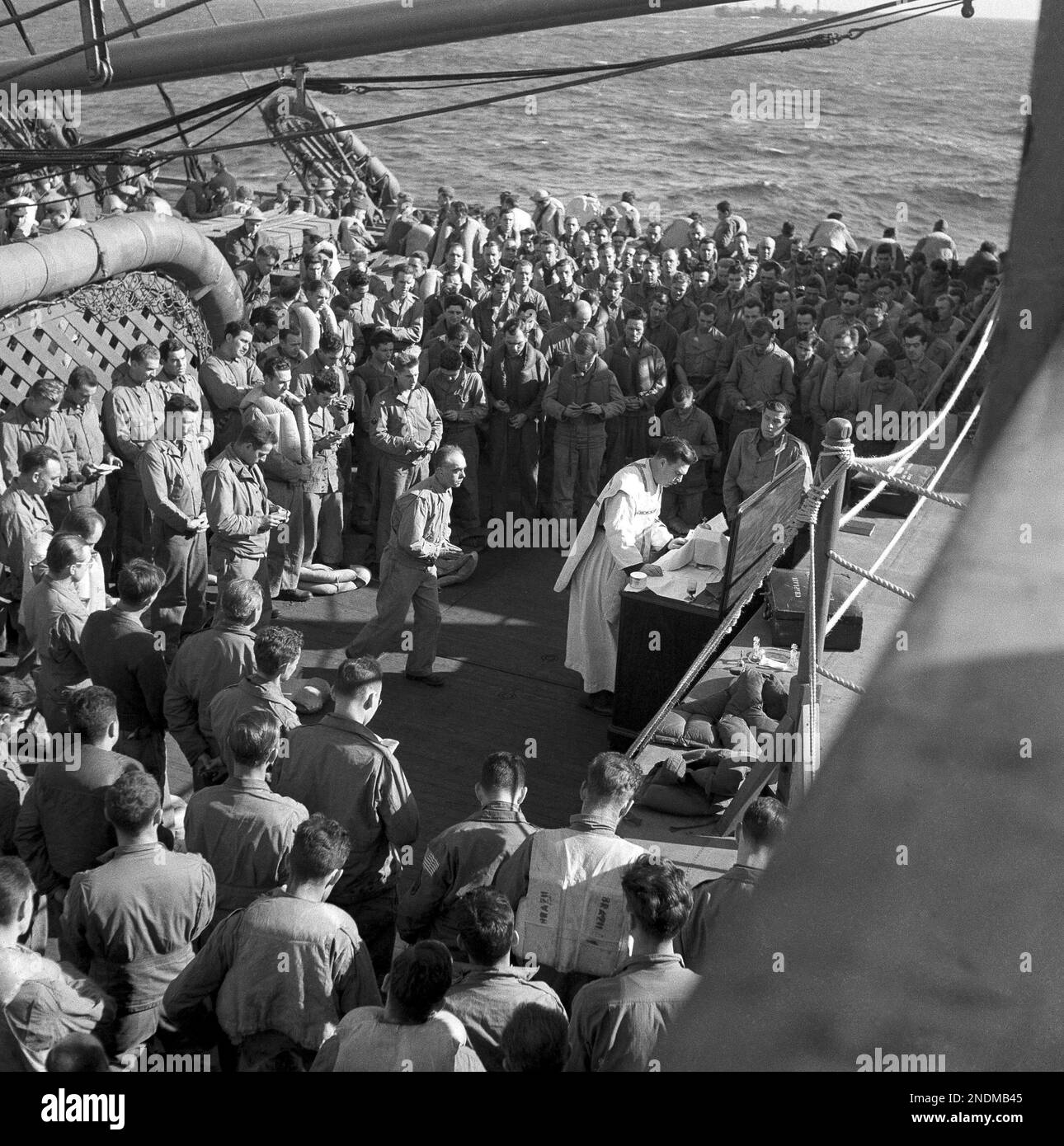A church service is held aboard an American army transport before ...