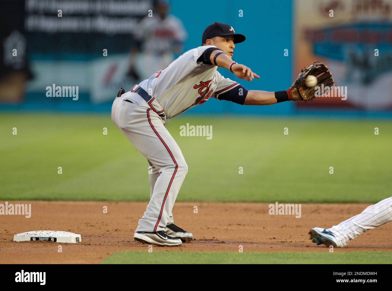 Atlanta Braves second baseman Martin Prado takes the throw at second ...