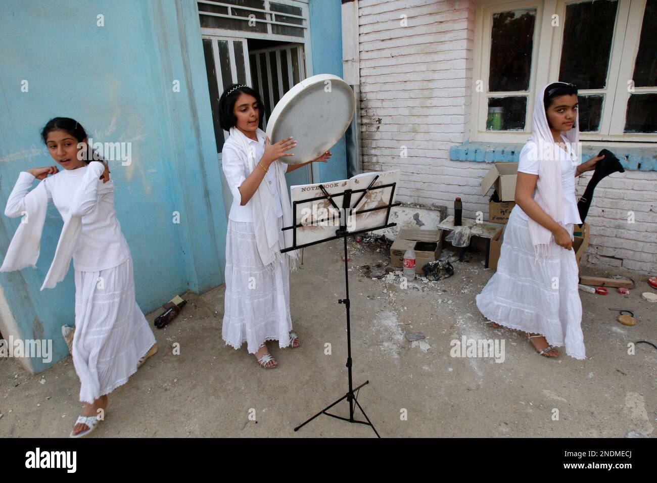 Iranian Zoroastrian girl, Aryanoush Keshavarzi, center, trains with her ...