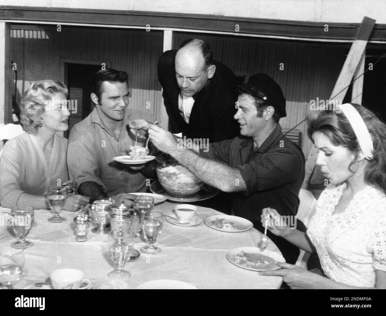 The engagement of actor Burt Reynolds (second from left) to starlet ...