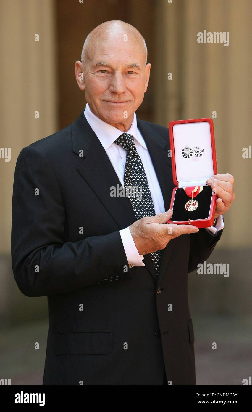 LONDON - JUNE 02: Actor Sir Patrick Stewart poses with his award after ...