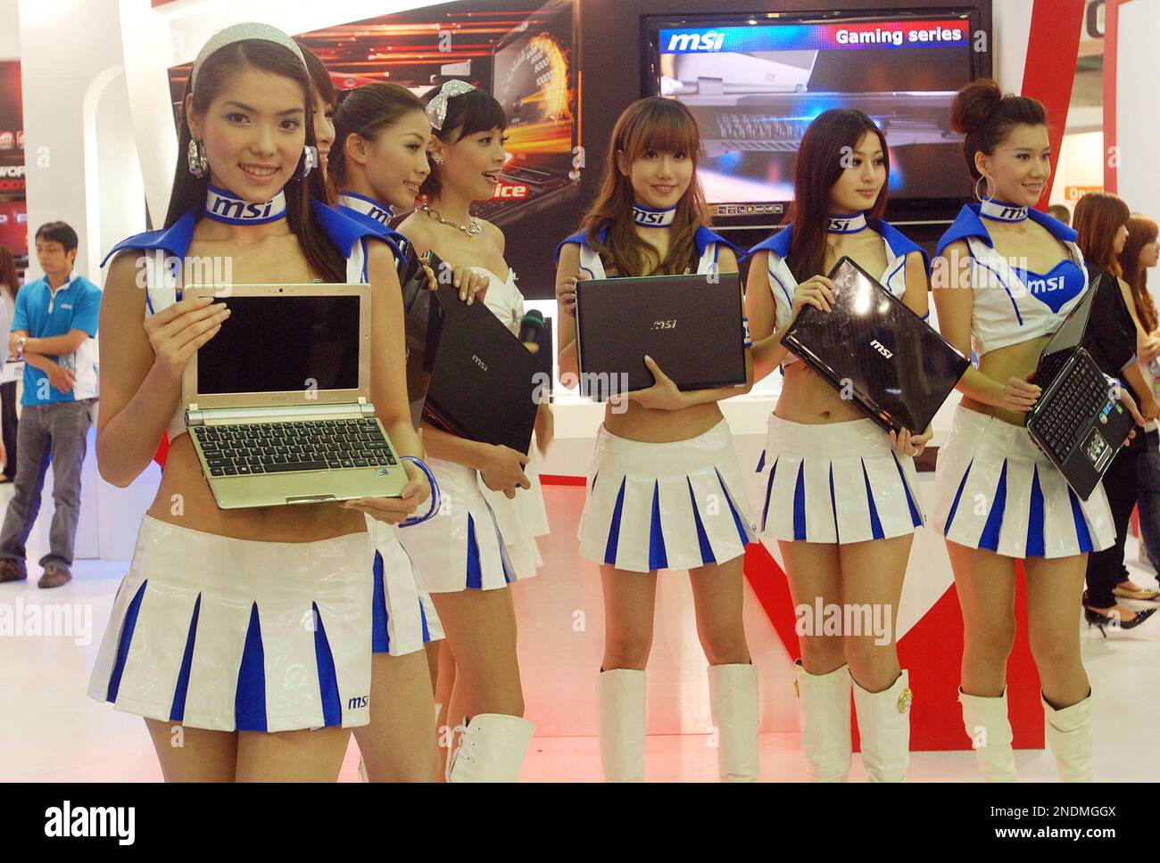 Models display MSI's new notebooks during the COMPUTEX 2010 Exhibition ...