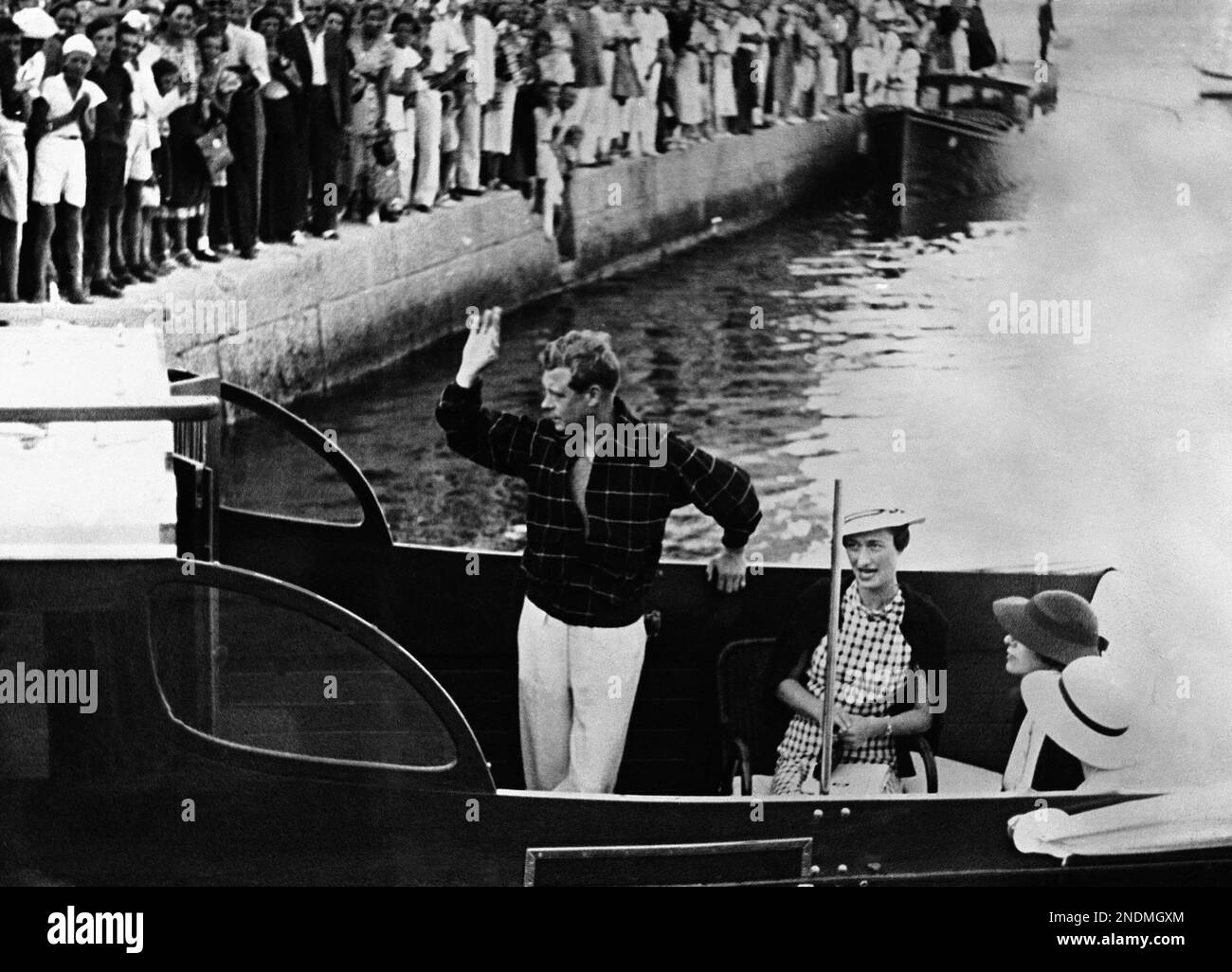 Britain's King Edward VIII , in informal dress, waving to crowd on the ...