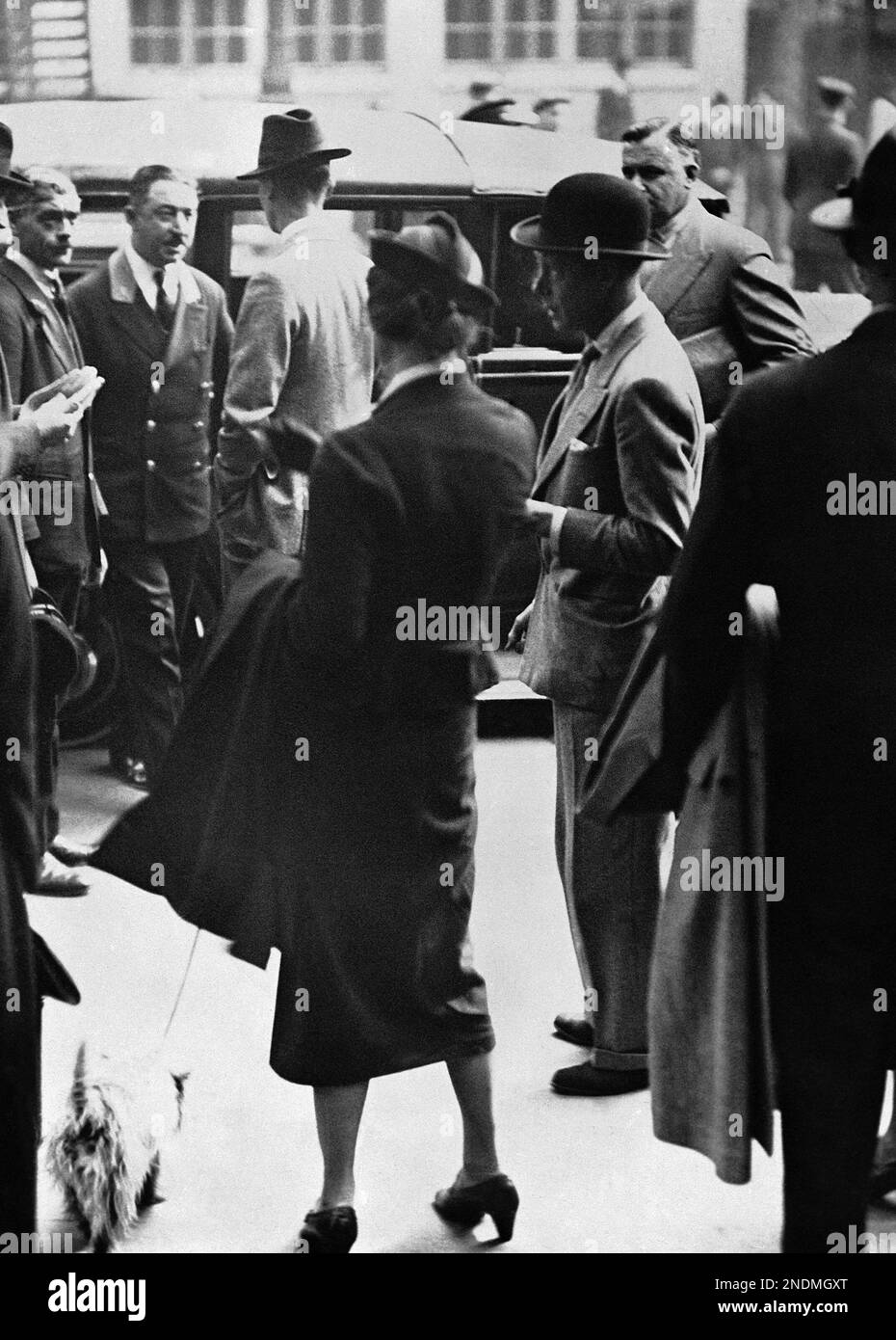 Britain's King Edward VIII talking with Wallis Simpson, back to camera ...