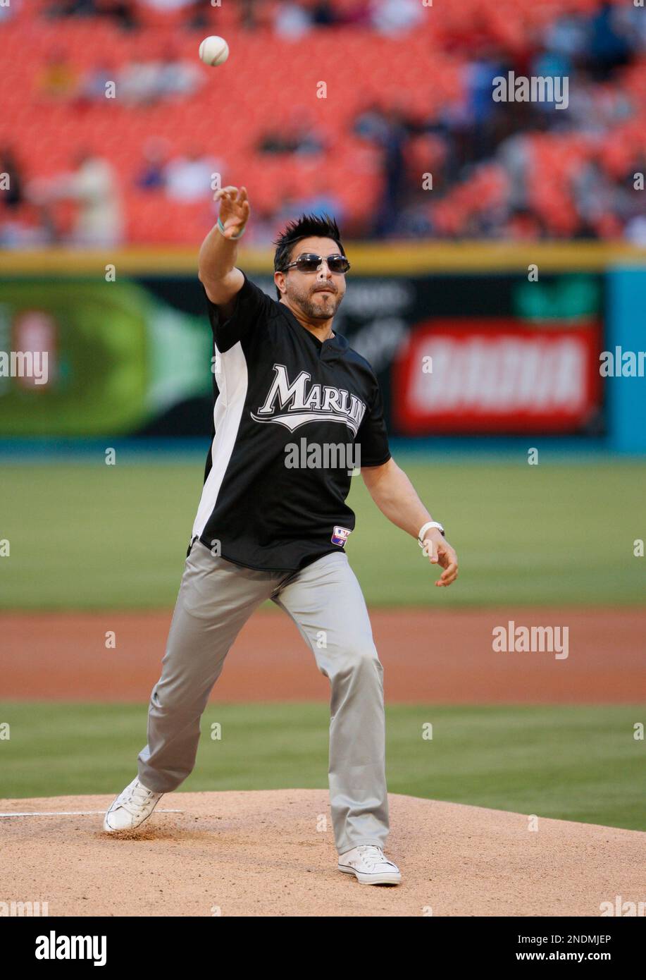 Nicaraguan singer Luis Enrique throws out a ceremonial first pitch ...