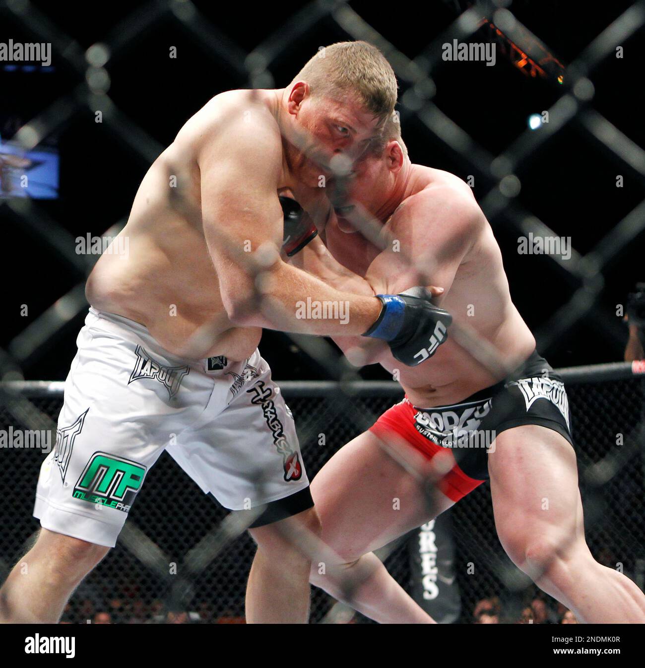 Mike Russow, left, fights Todd Duffee during their UFC heavyweight ...