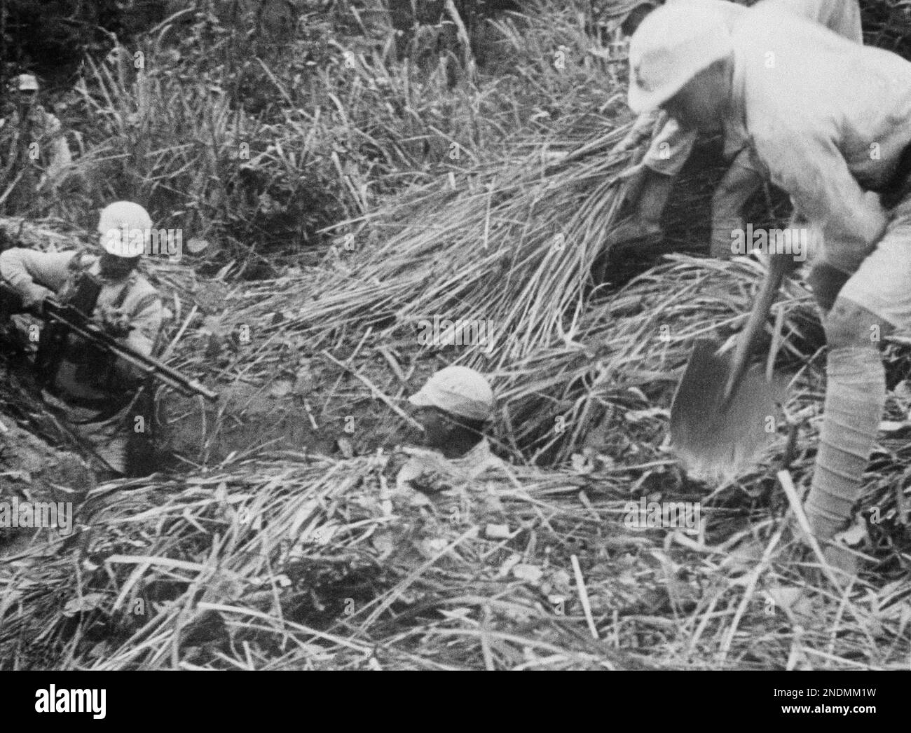 Chinese troops dig anti-tank traps and machine gun nests in strategic ...