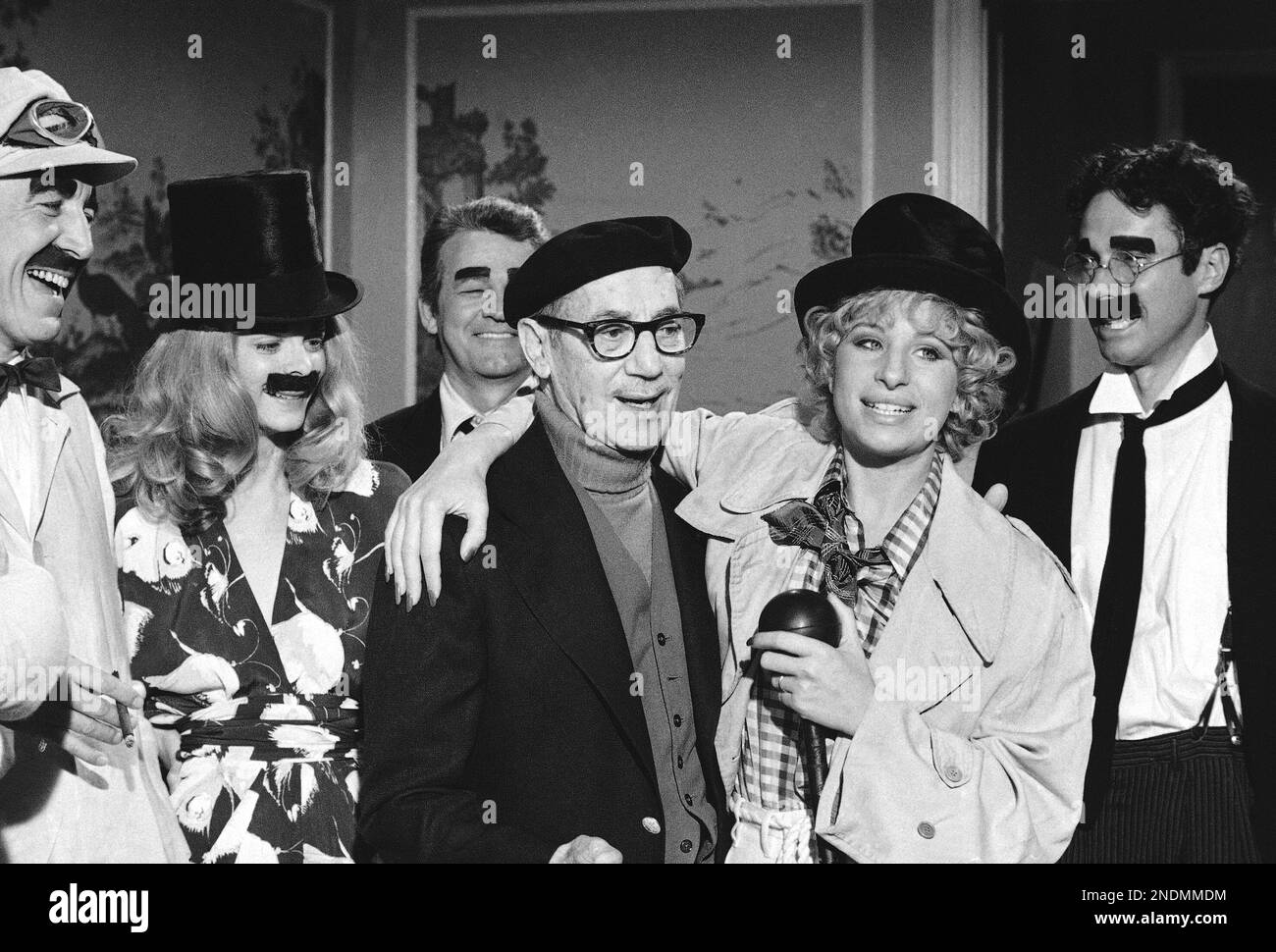 Here, Groucho Marx visits Barbra Streisand, who’s filming a Marx ...
