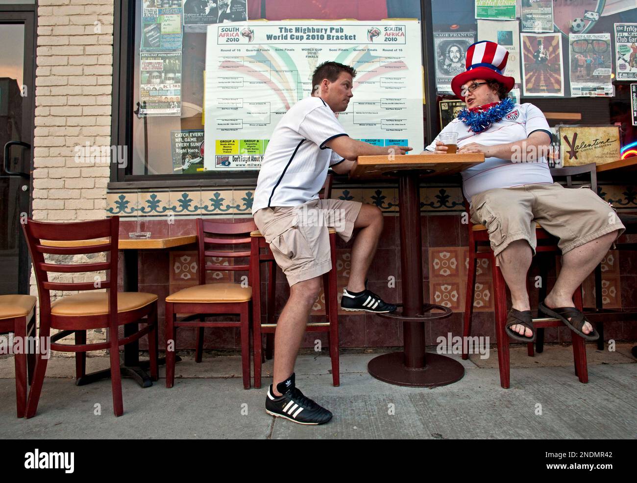 In this May 25, 2010 photo, soccer fans Jeremy Mattson, right, and Kirk ...