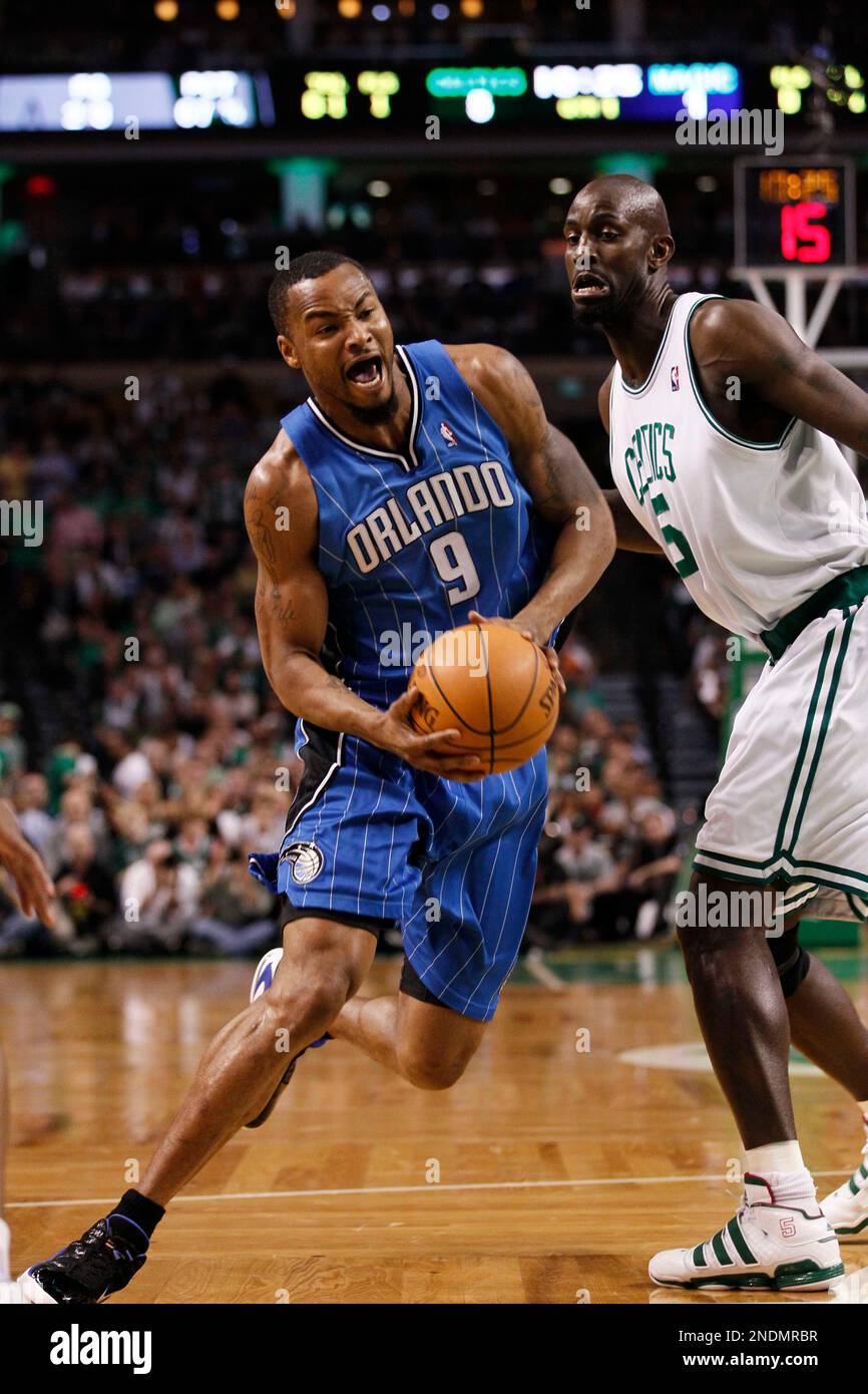 Orlando Magic forward Rashard Lewis drives past Boston Celtics forward ...