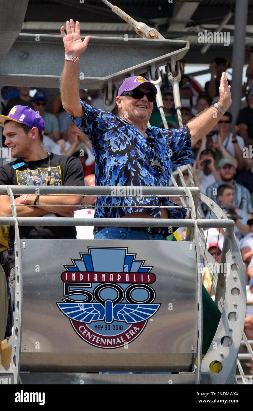Actor Jack Nicholson waves to fans from the flag stand before ...