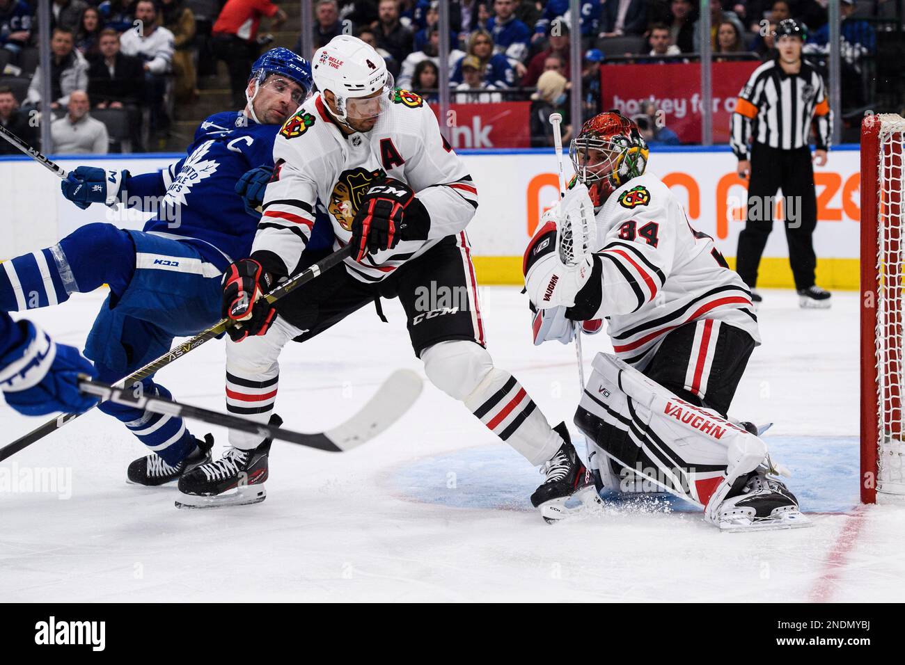 Toronto Maple Leafs center John Tavares (91) is tripped by Chicago ...
