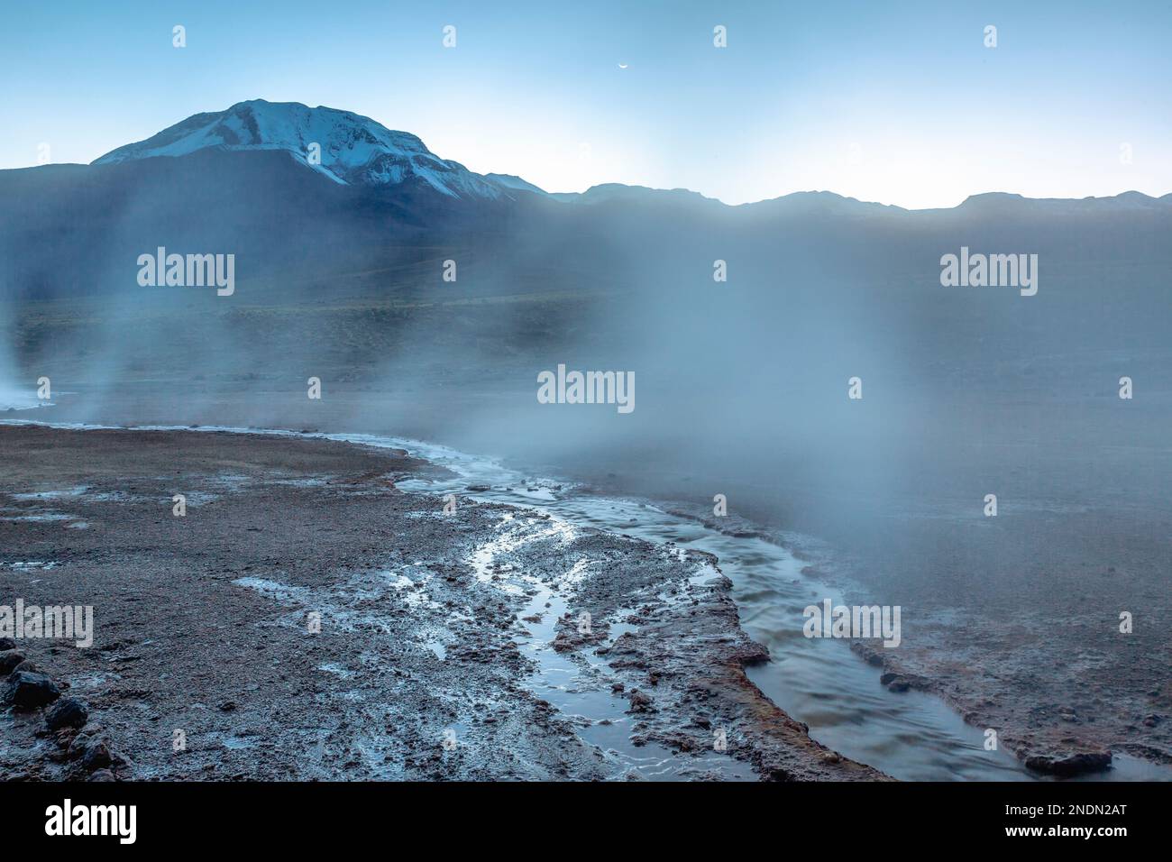 Geysers El Tatio with river and Peaceful dramatic volcanic landscape at ...