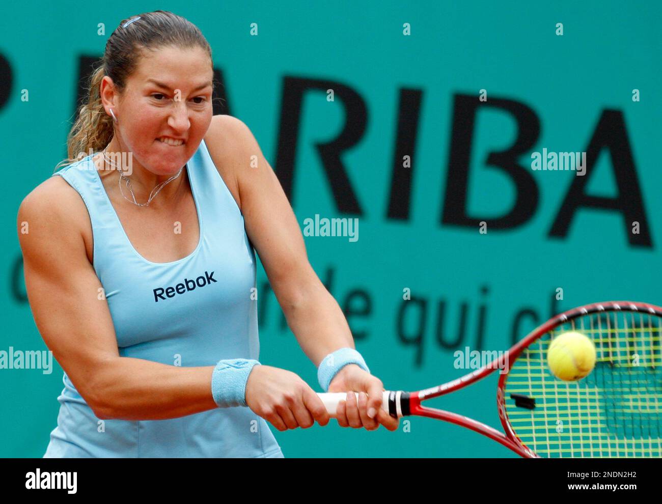 Israel's Shahar Peer returns the ball to France's Marion Bartoli during ...