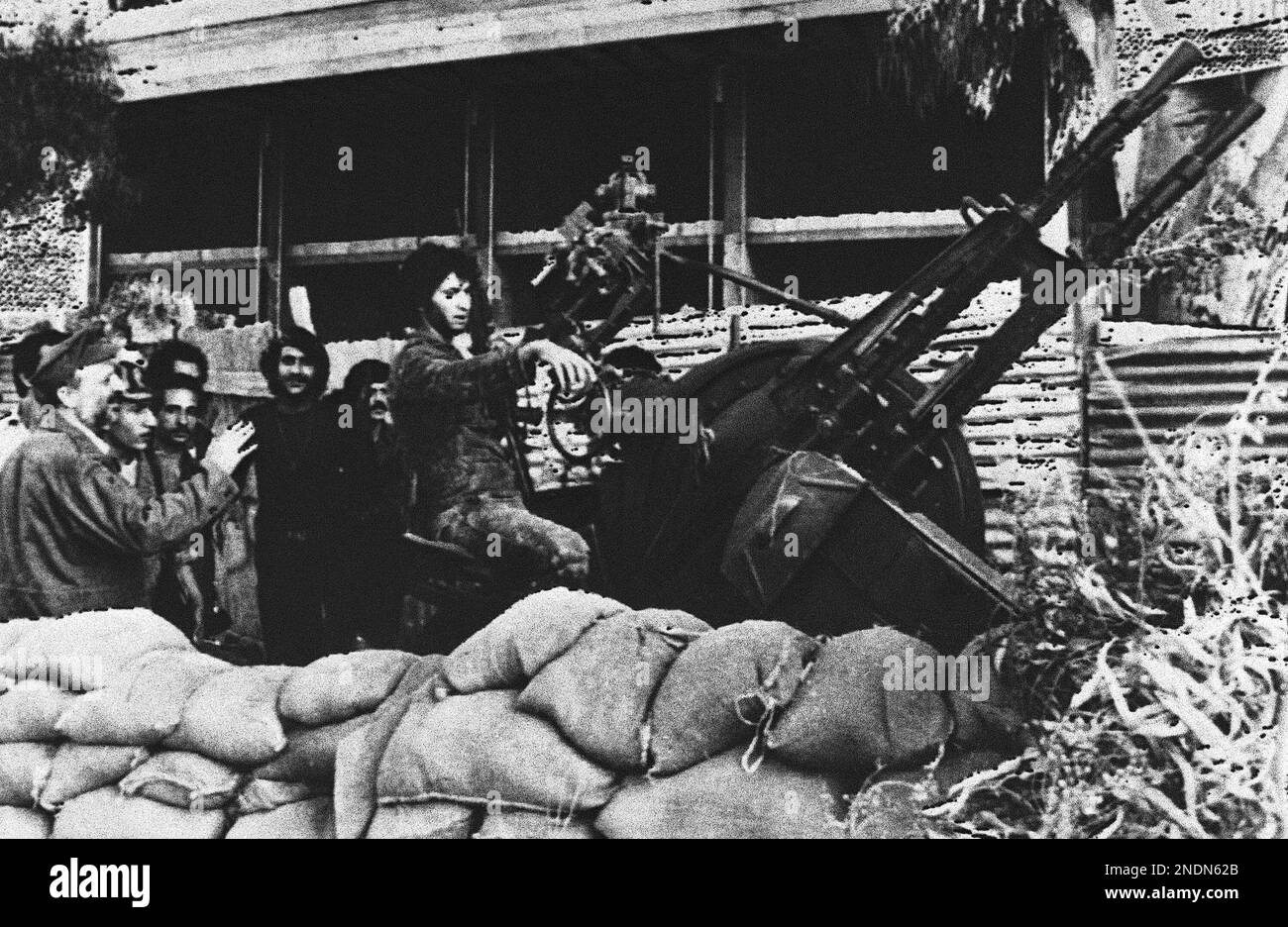 PLO leader Yasser Arafat, left, visits some of his men at a West Beirut ...