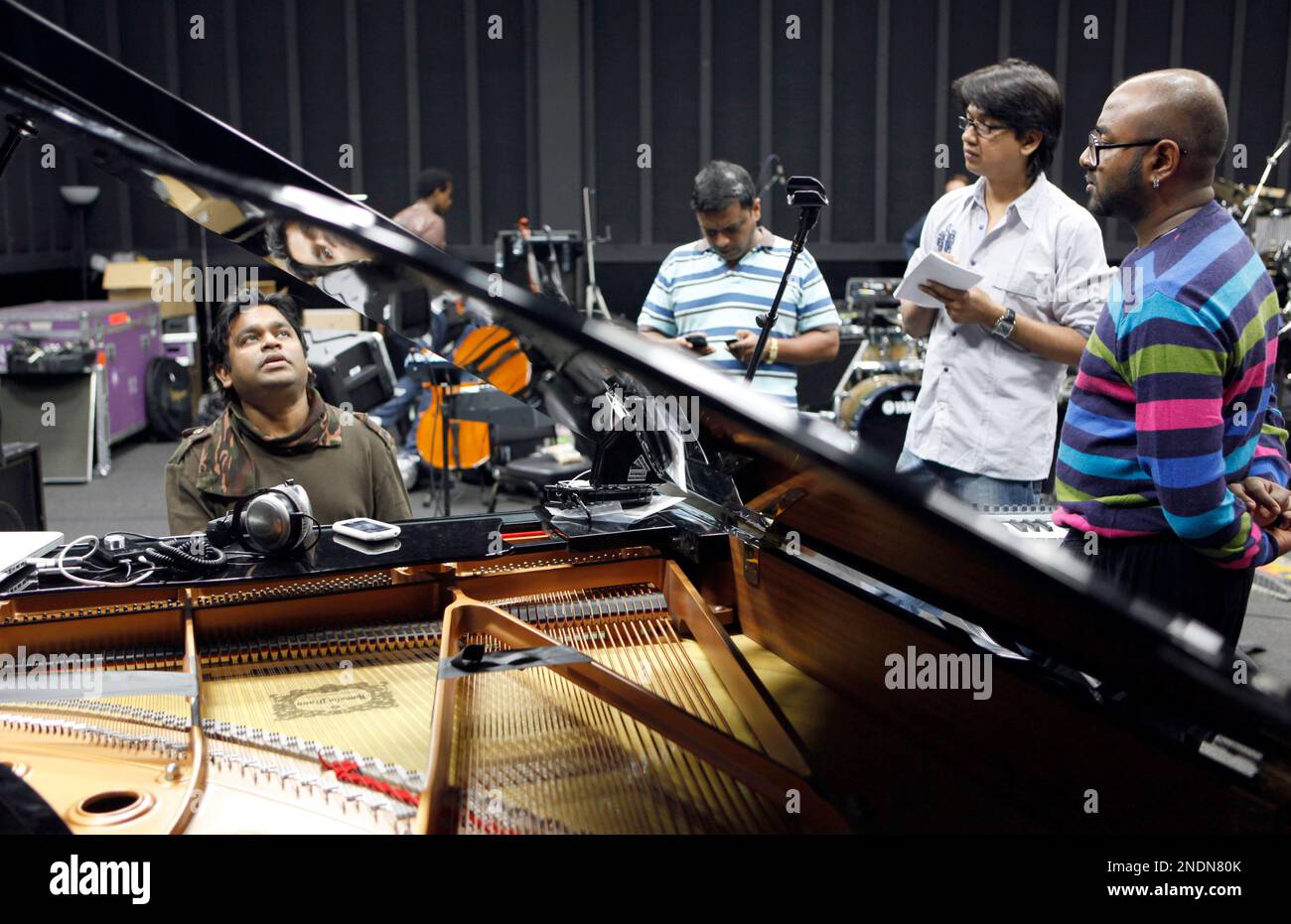 Indian composer A.R. Rahman, left, and his staff rehearse for an ...