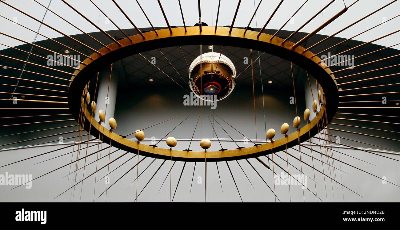 The giant ball of the world's largest Foucault Pendulum tells time as ...