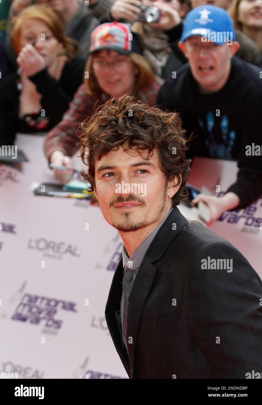 British actor Orlando Bloom poses for the photographers as he arrives ...