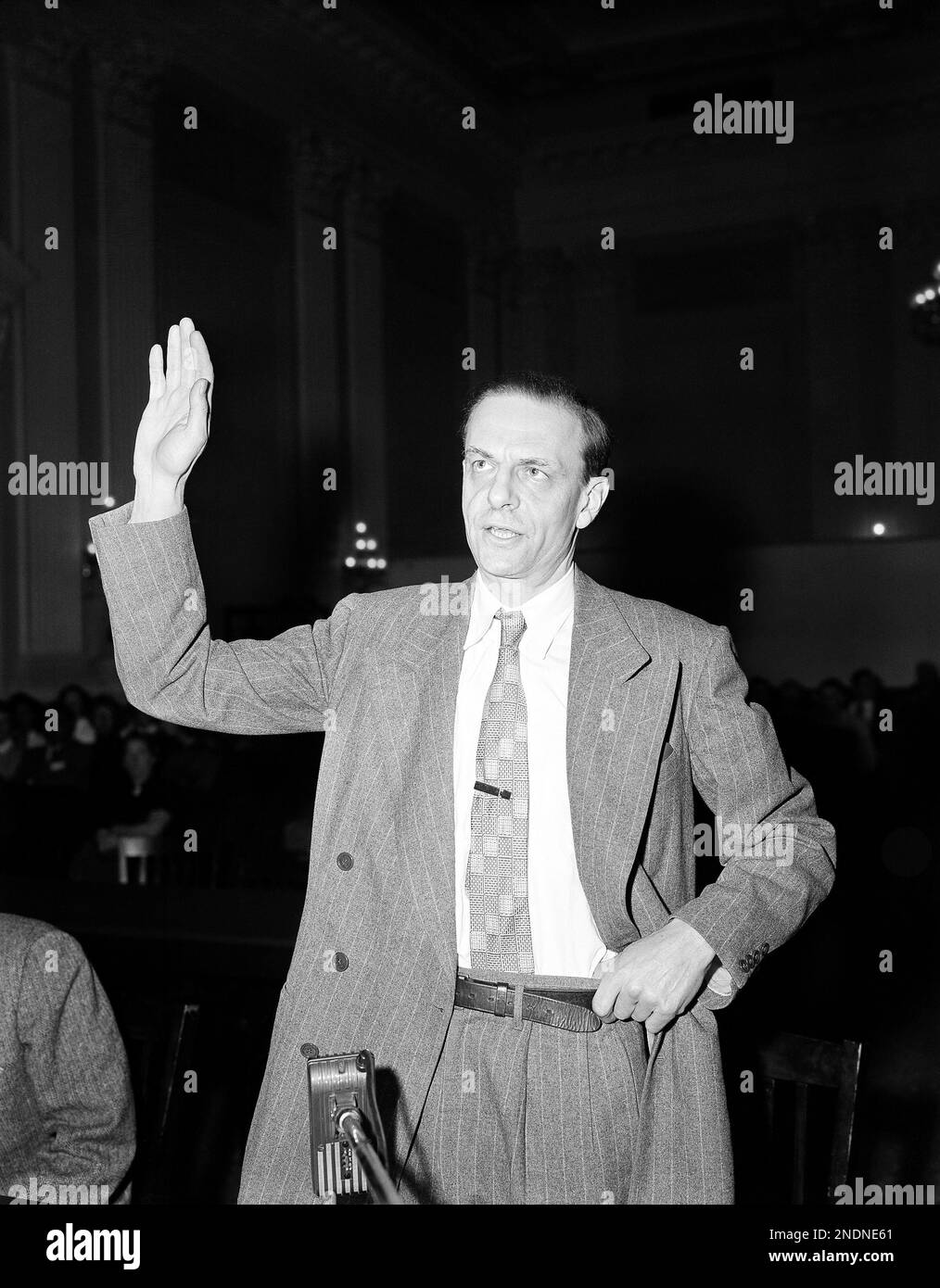 Victor Perlo, New York economic consultant, takes the oath before ...