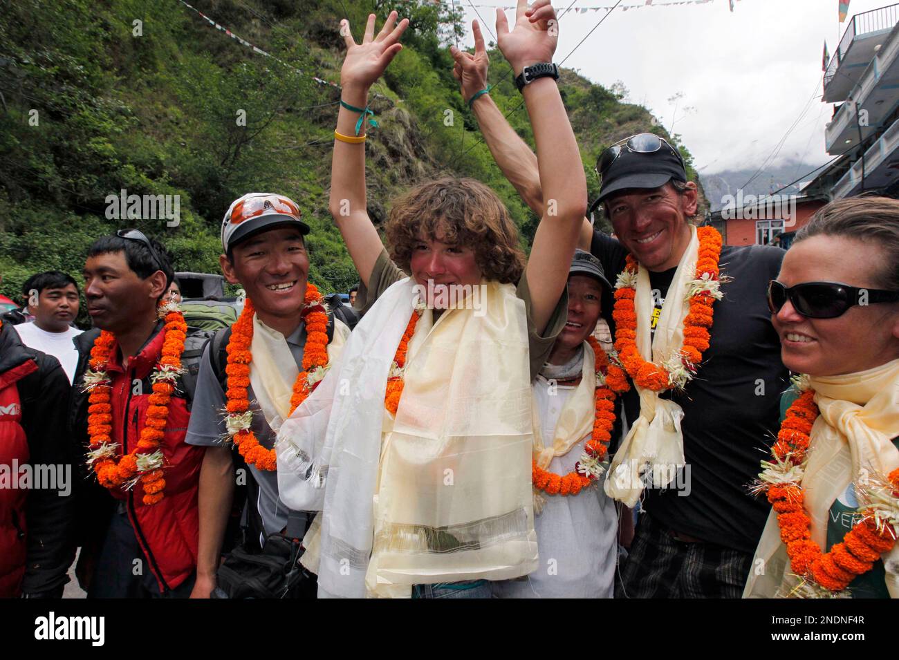 Jordan Romero, center, the 13-year-old American who Saturday became the ...