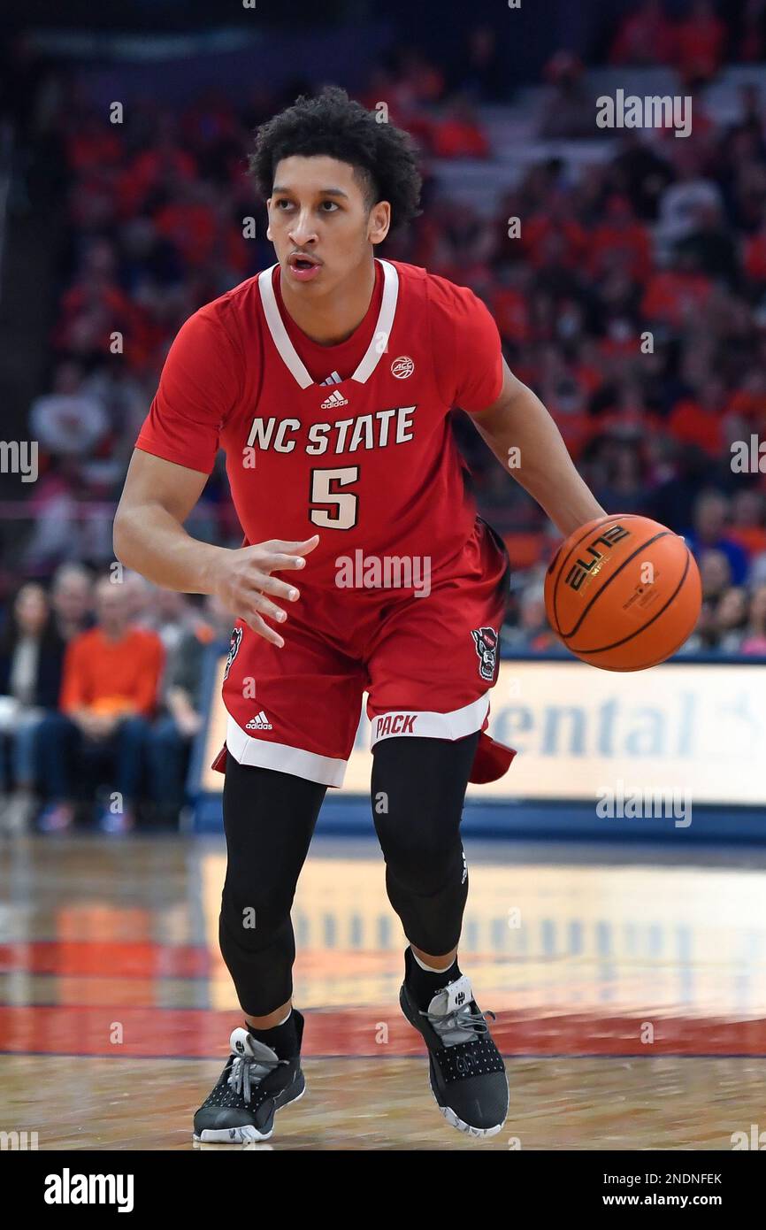 North Carolina State guard Jack Clark (5) handles the ball against ...