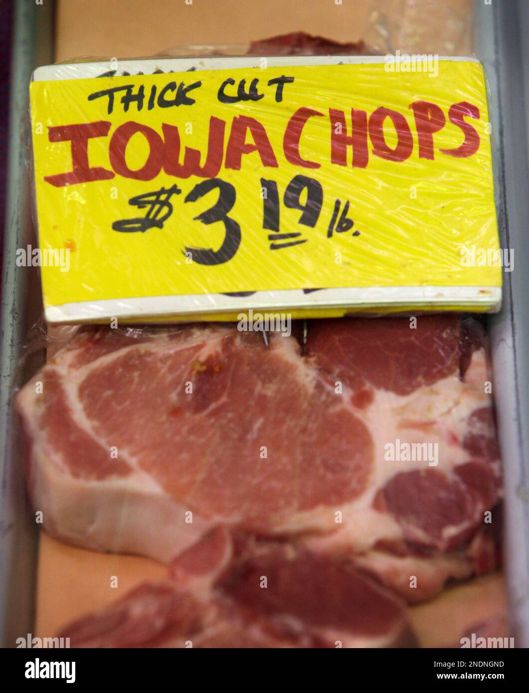 Pork chops are seen in the B&B Grocery, Meat and Deli, Tuesday, May 25 ...