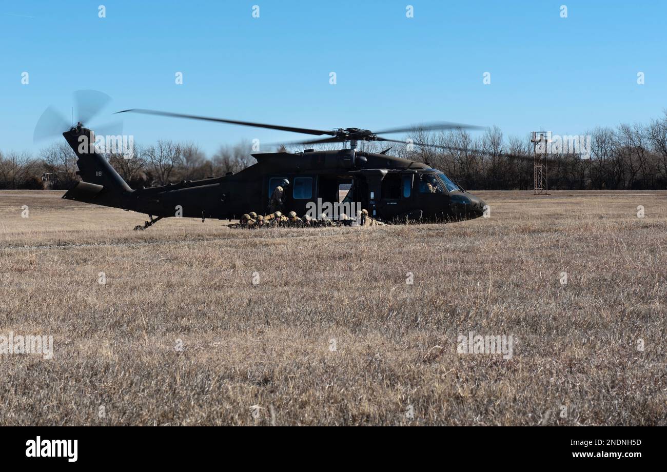 Airmen from the 22nd Security Forces Squadron take cover as a U.S. Army ...