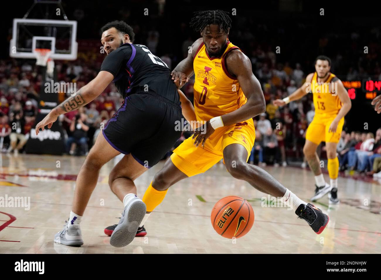 Iowa State forward Tre King (0) fights for a loose ball with TCU ...