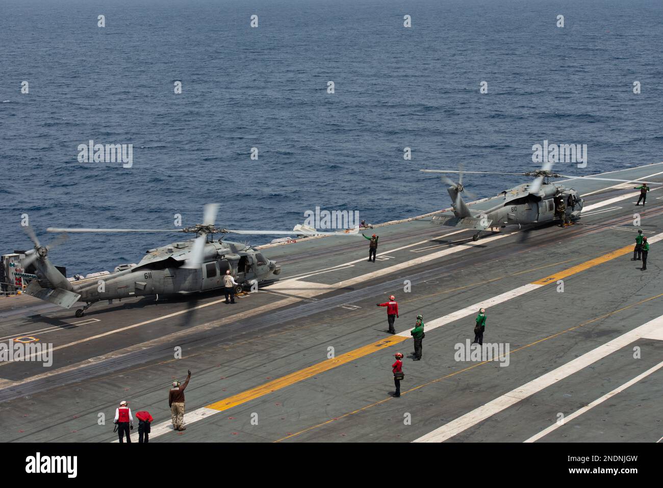 230215-N-WM182-2077 SOUTH CHINA SEA (Feb. 15, 2023) Two MH-60S Sea Hawk ...