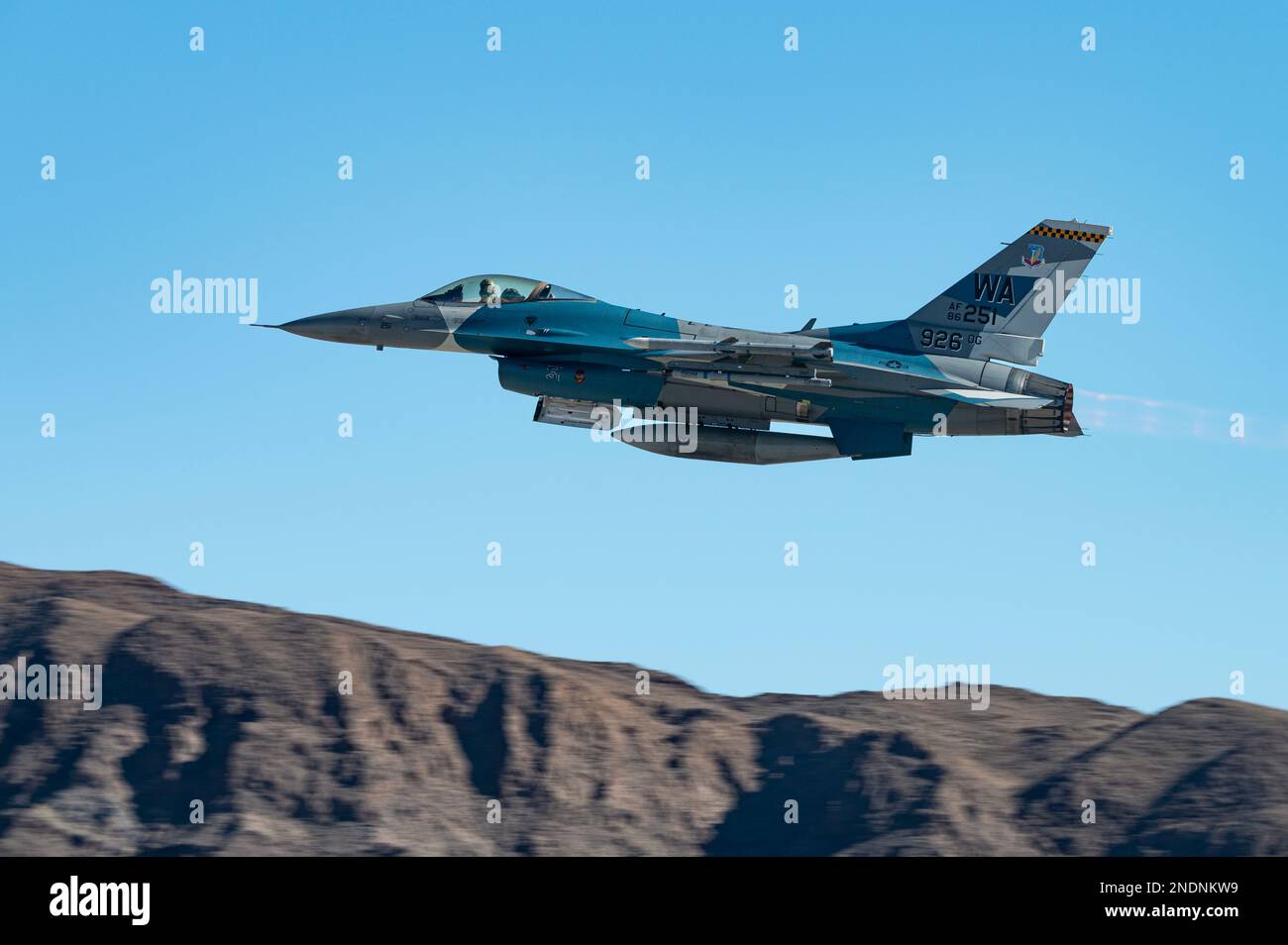 An F-16 Aggressor assigned to the 64th Aggressor Squadron, Nellis Air ...