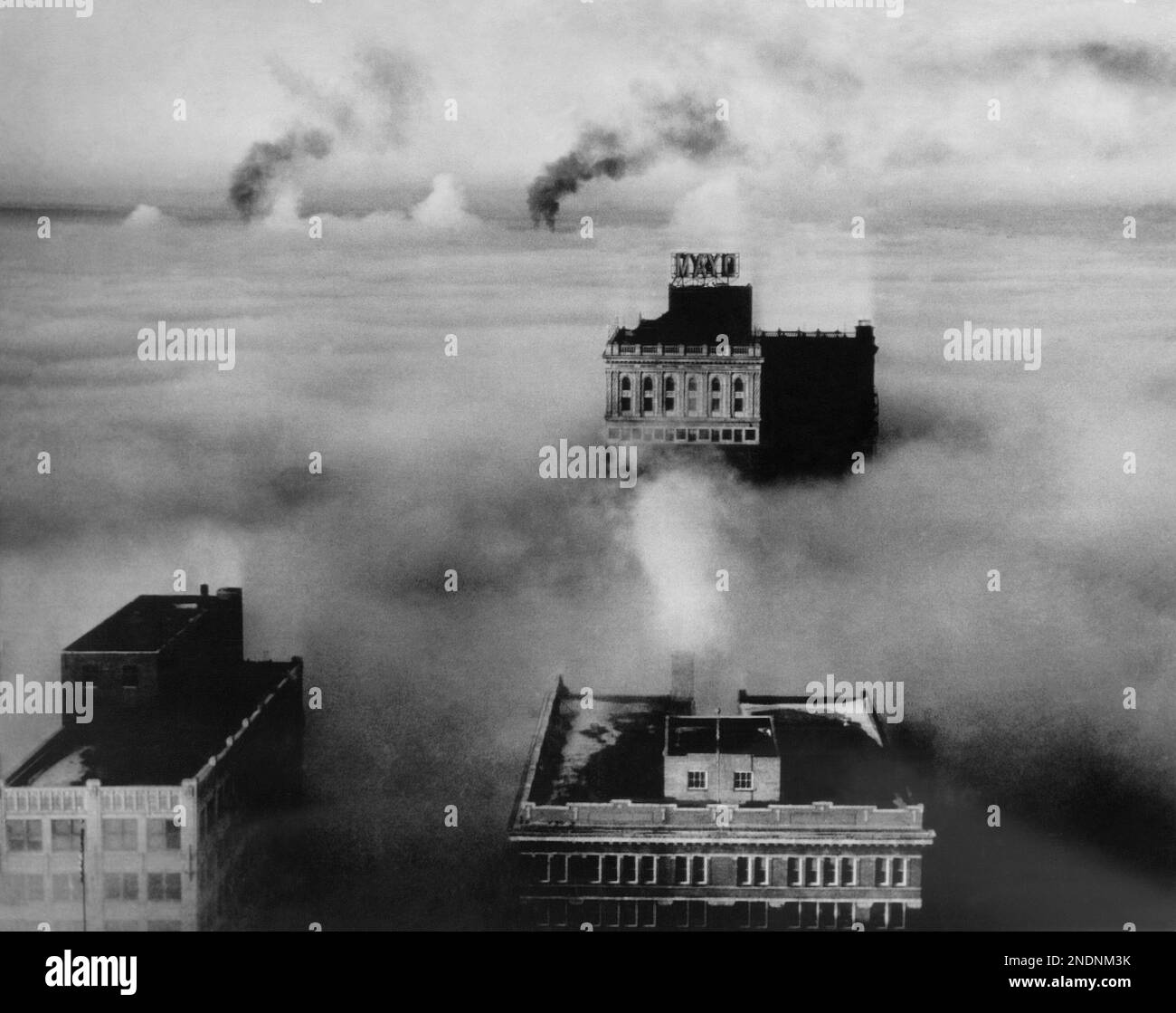 Only three buildings and several columns of smoke venture above this ...