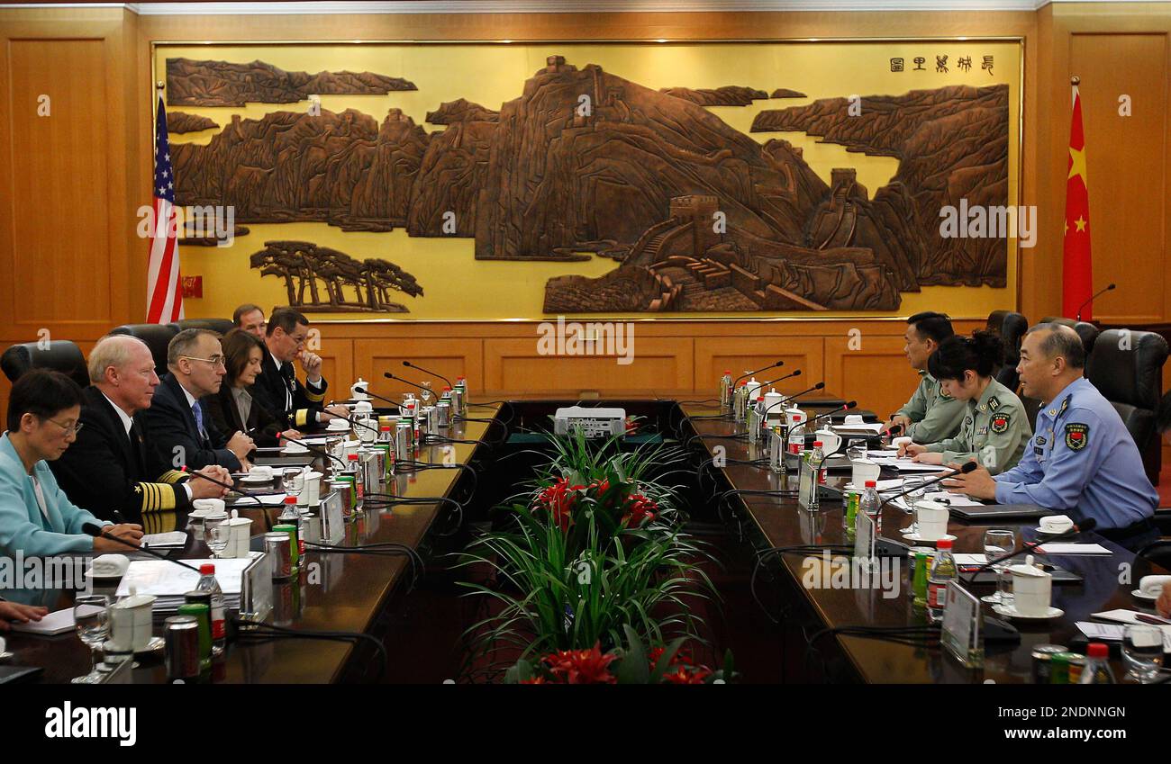 Adm. Robert F. Willard, commander of the U.S. Pacific Command, 2nd left ...
