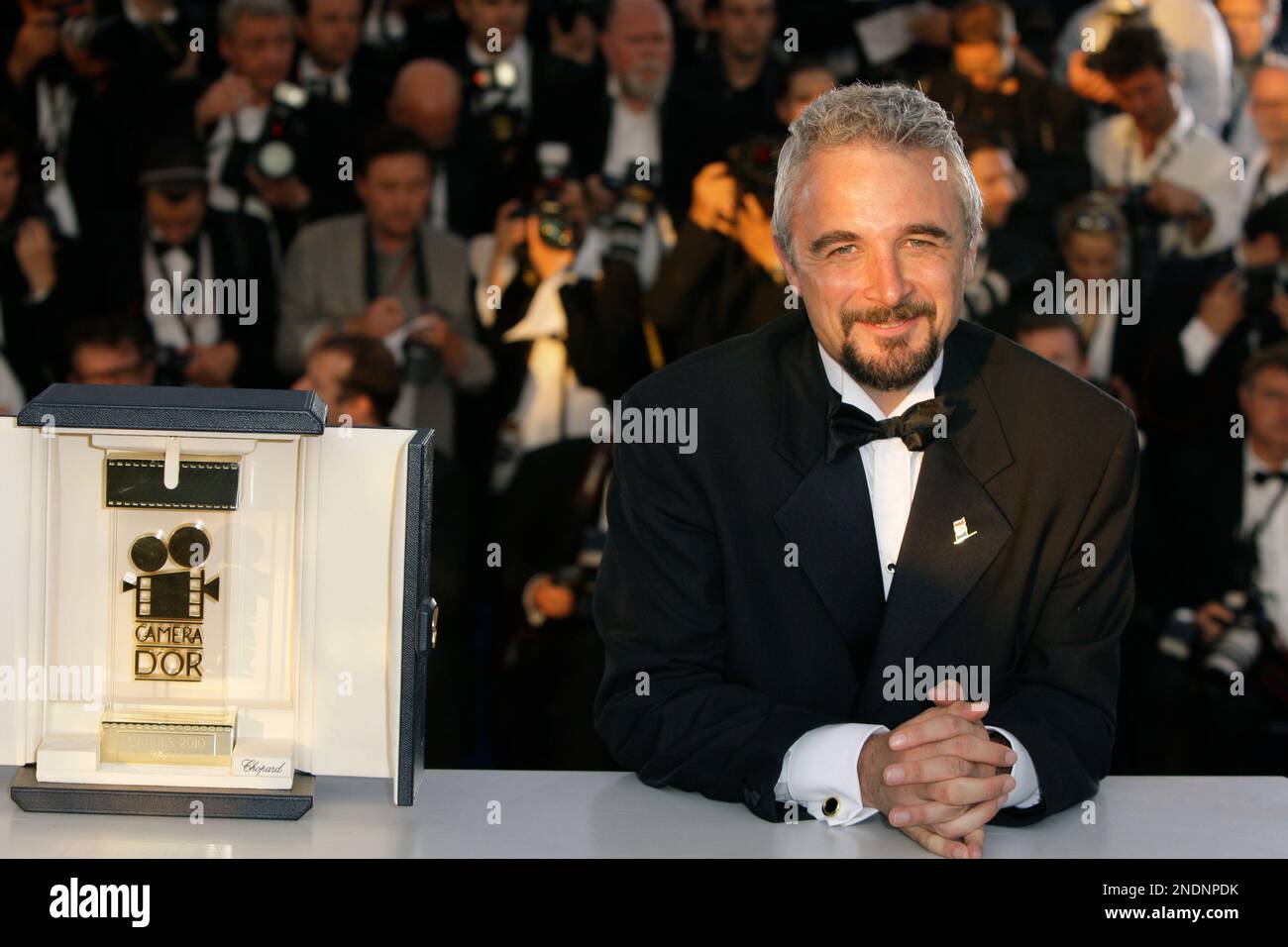 Michael Rowe, winner of the Camera D'Or Award, poses after the awards ...