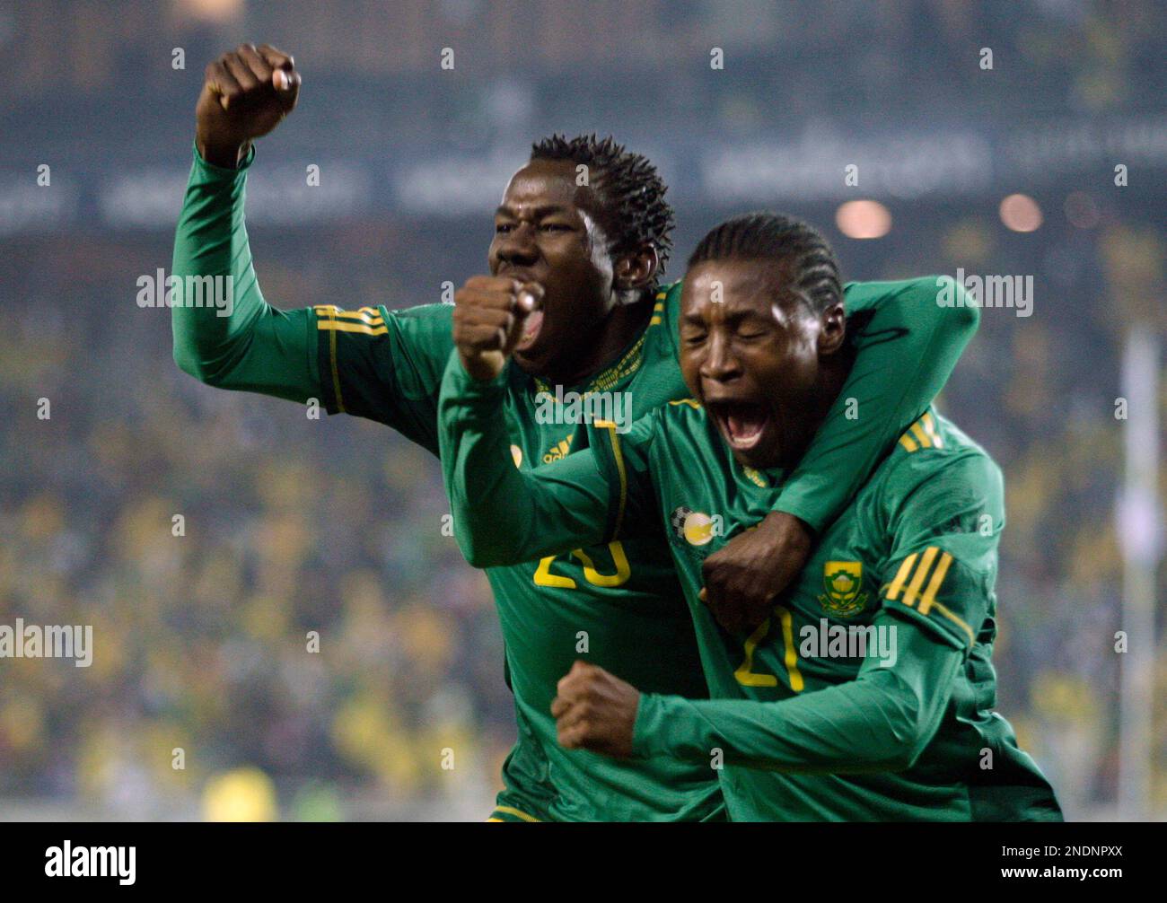 South Africa's Siyabonga Sangweni, right, celebrates with a teammate ...