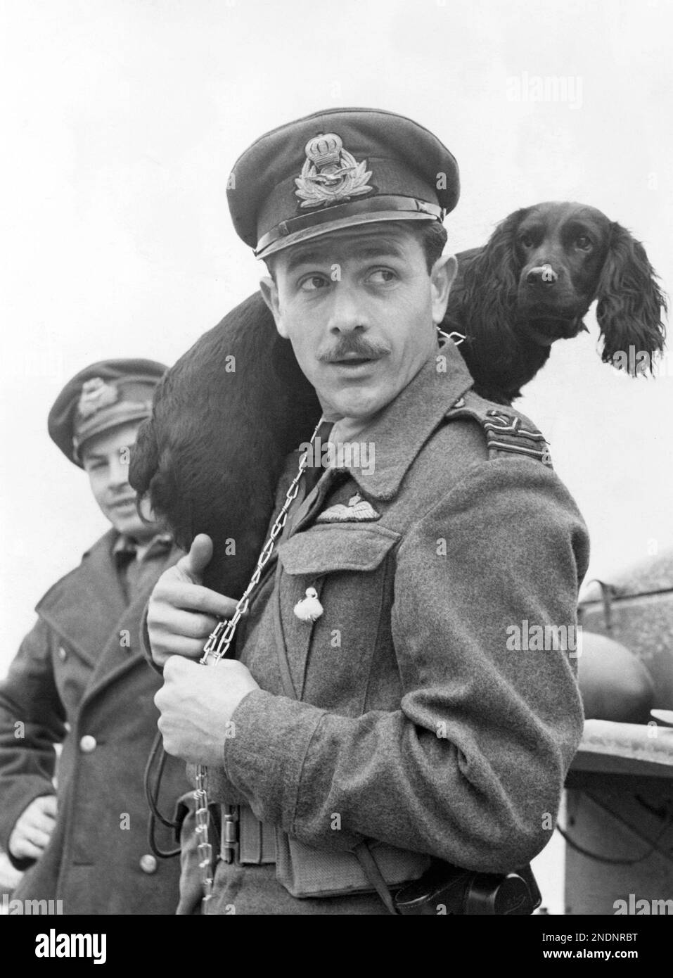 A Greek Flight commander shown March 6, 1942, has made a $40.00 wager ...